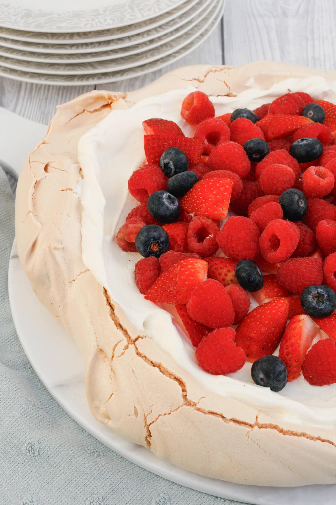 Chill your berry pavlova for an hour before serving. Serve and enjoy!